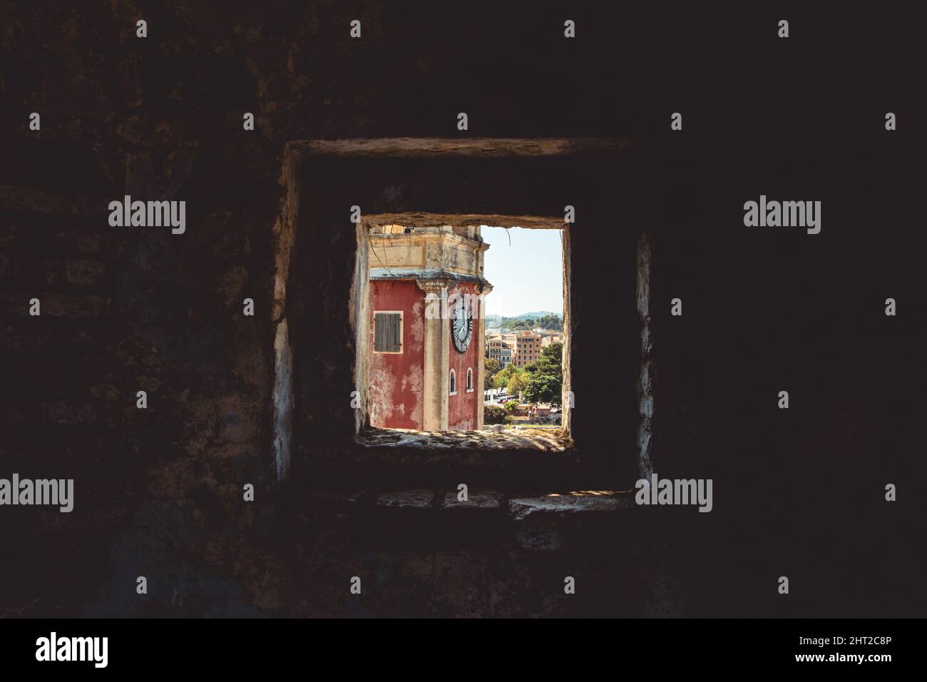 Old building seen from a small window Stock Photo - Alamy