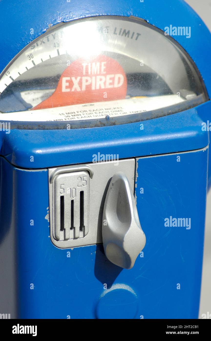 Parking meter which take coins for the fee use of the space on public ...