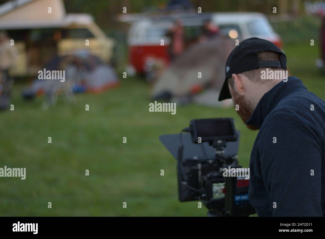 Back view of a cinematographer setting up the shot Stock Photo - Alamy