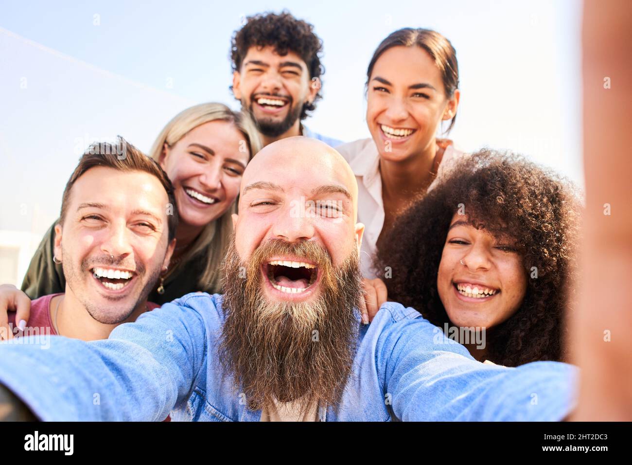 Cheerful Group of friends posing for a photo and having fun. Friendship ...