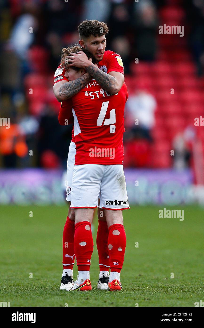 Matty Wolfe of Barnsley and Barnsley's Callum Styles congratulate each ...