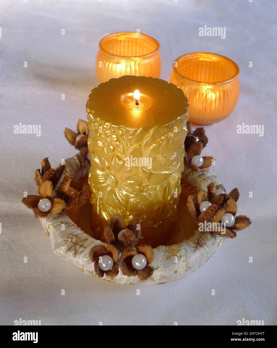Block candle with candle cuff Stock Photo - Alamy