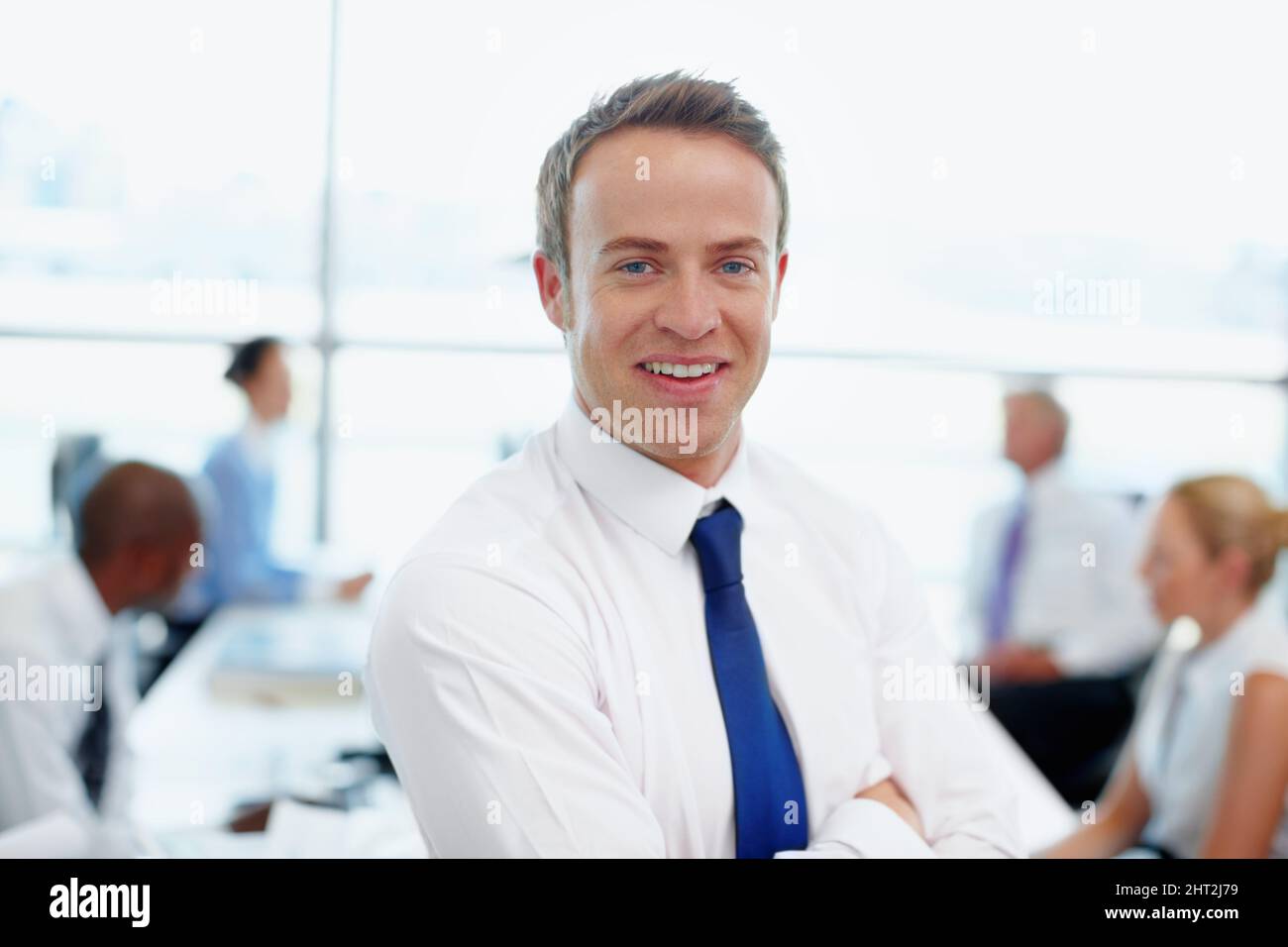 One day hell be CEO. Handsome young male executive in his workplace ...