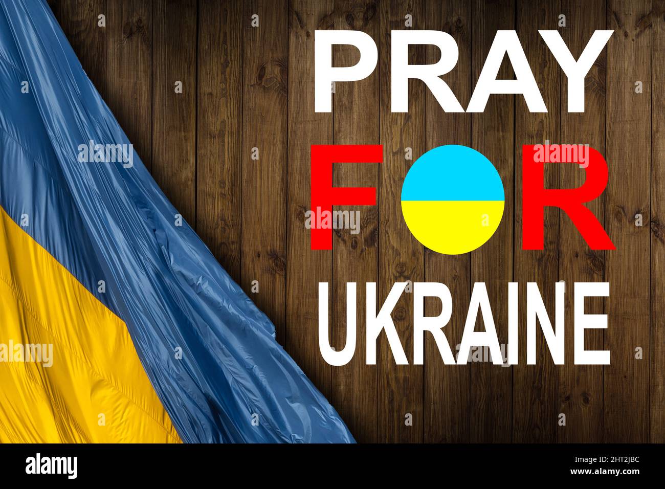 Ukraine flag. Pray for Ukraine. Ukraine flag in front of dark sky. Flag ...