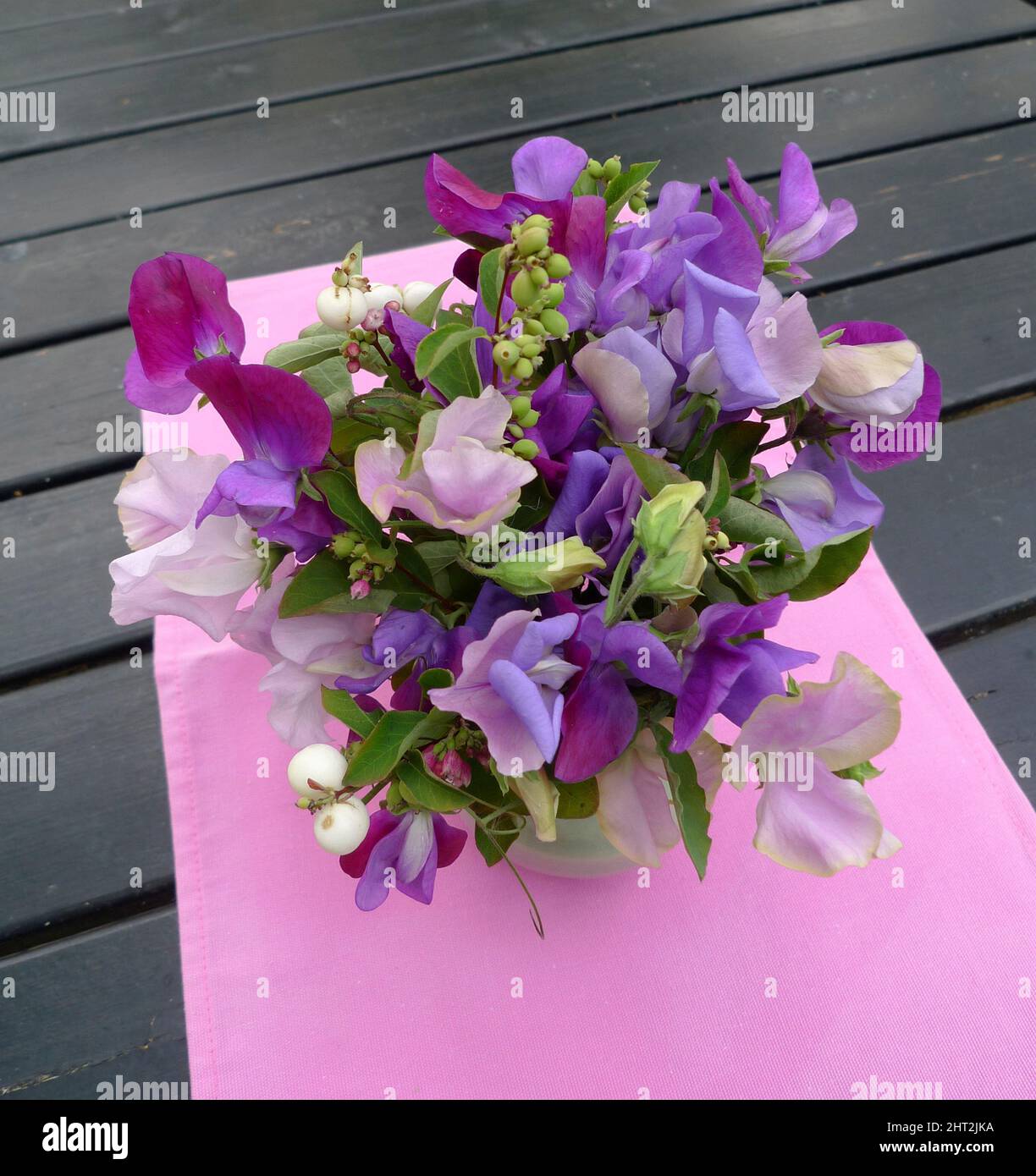 Sweet pea bouquet with snow berries Stock Photo - Alamy