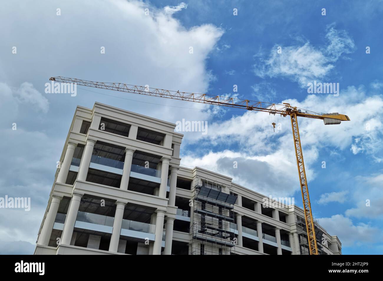Industrial crane working on construction building site,workplace ...