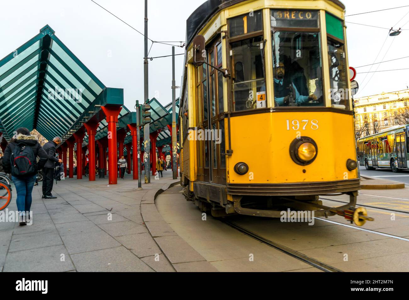 Beautiful shot of a yellow train in the Milano Cadorna Railway Station ...