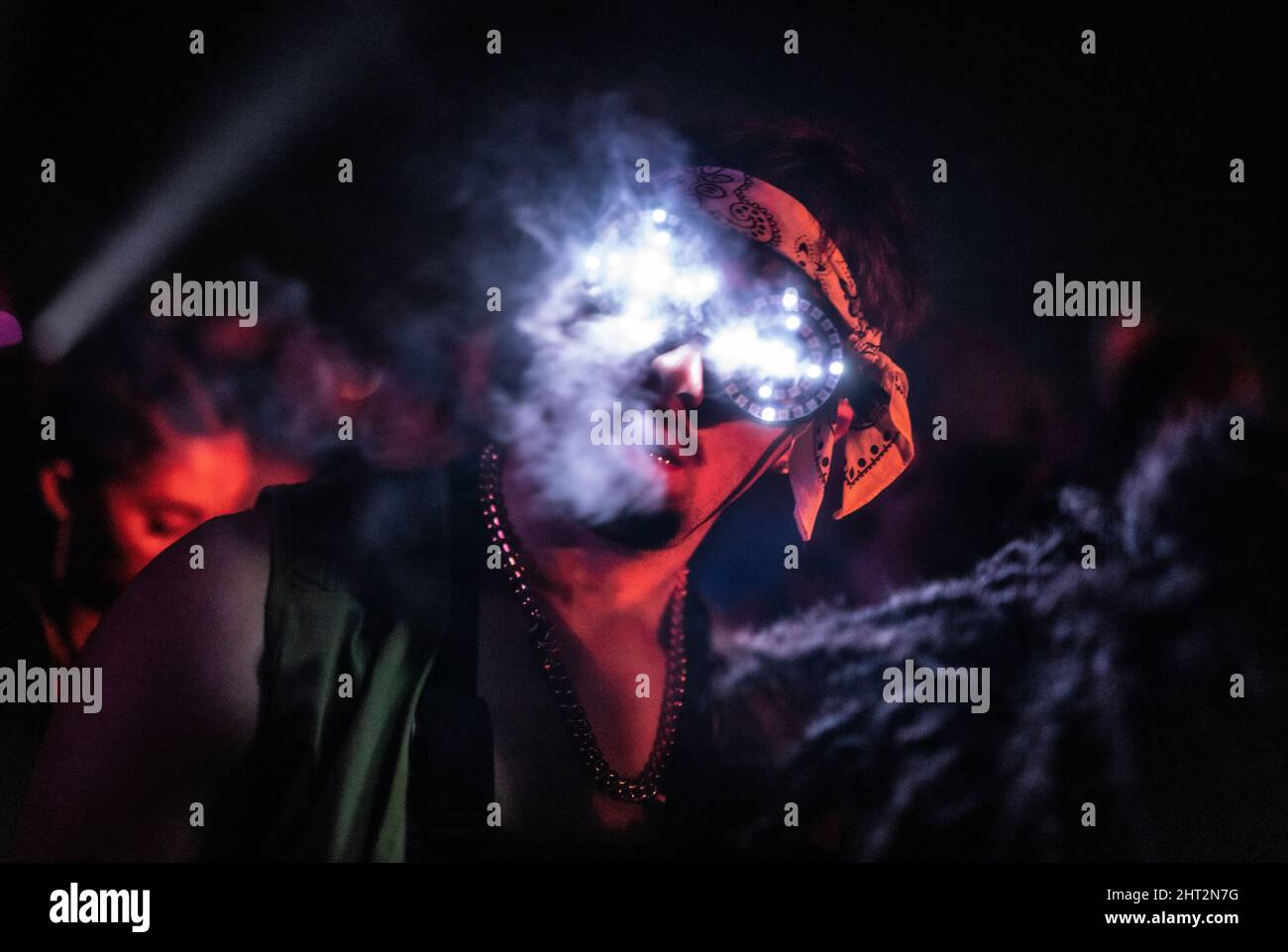Closeup shot of a man smoking a cigarette at night Stock Photo - Alamy