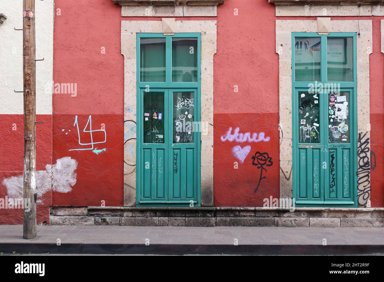 Photo of turquoise doors of a building in a slum neighborhood Stock ...