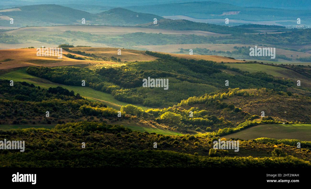 Aerial view of beautiful sunny hills and valleys Stock Photo - Alamy