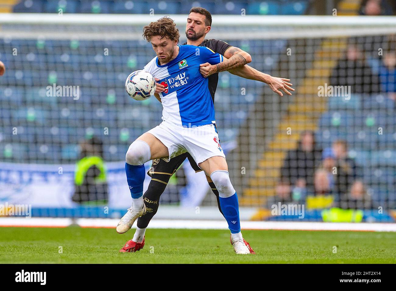 Sam Gallagher #9 of Blackburn Rovers challenged by the opponent Stock ...