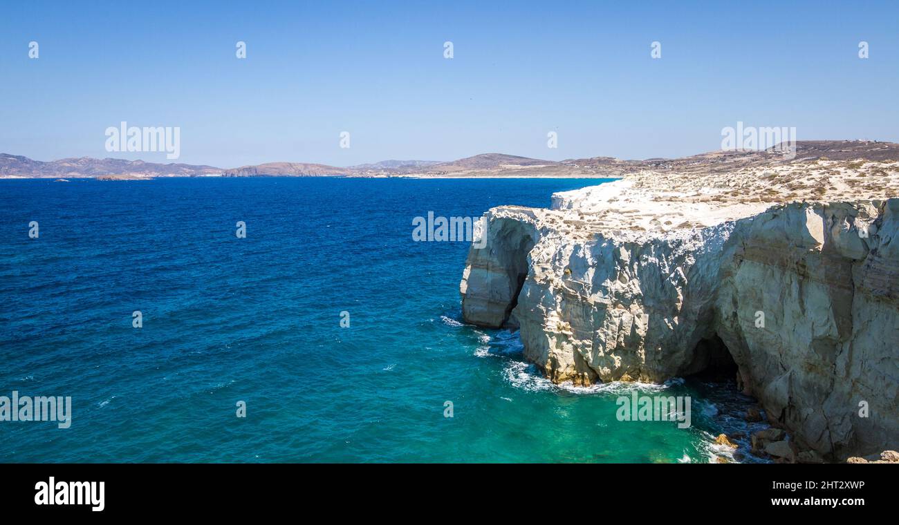 Beautiful view of rocky cliffs by the seawater in Sarakiniko Beach, the ...