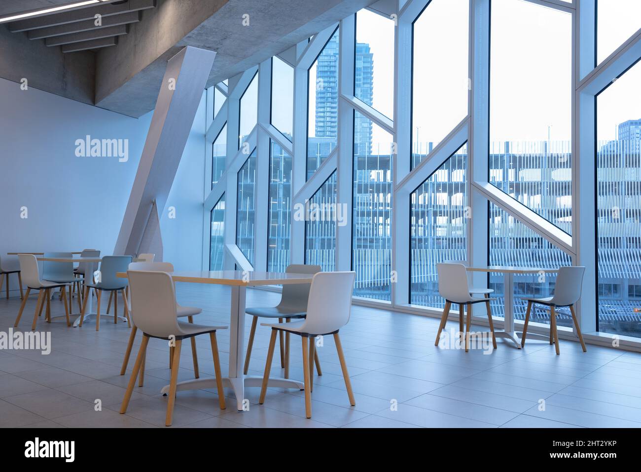 Clean, white seating area in Central Library with a city view in ...