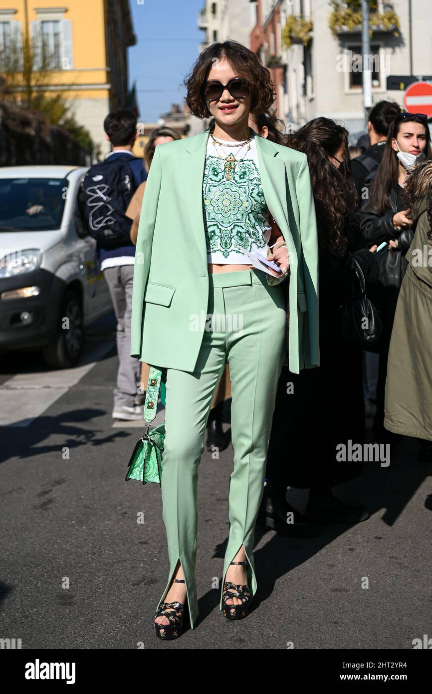 Milan, Italy: February 25, 2022: A guest arrives at the Milan Fashion ...