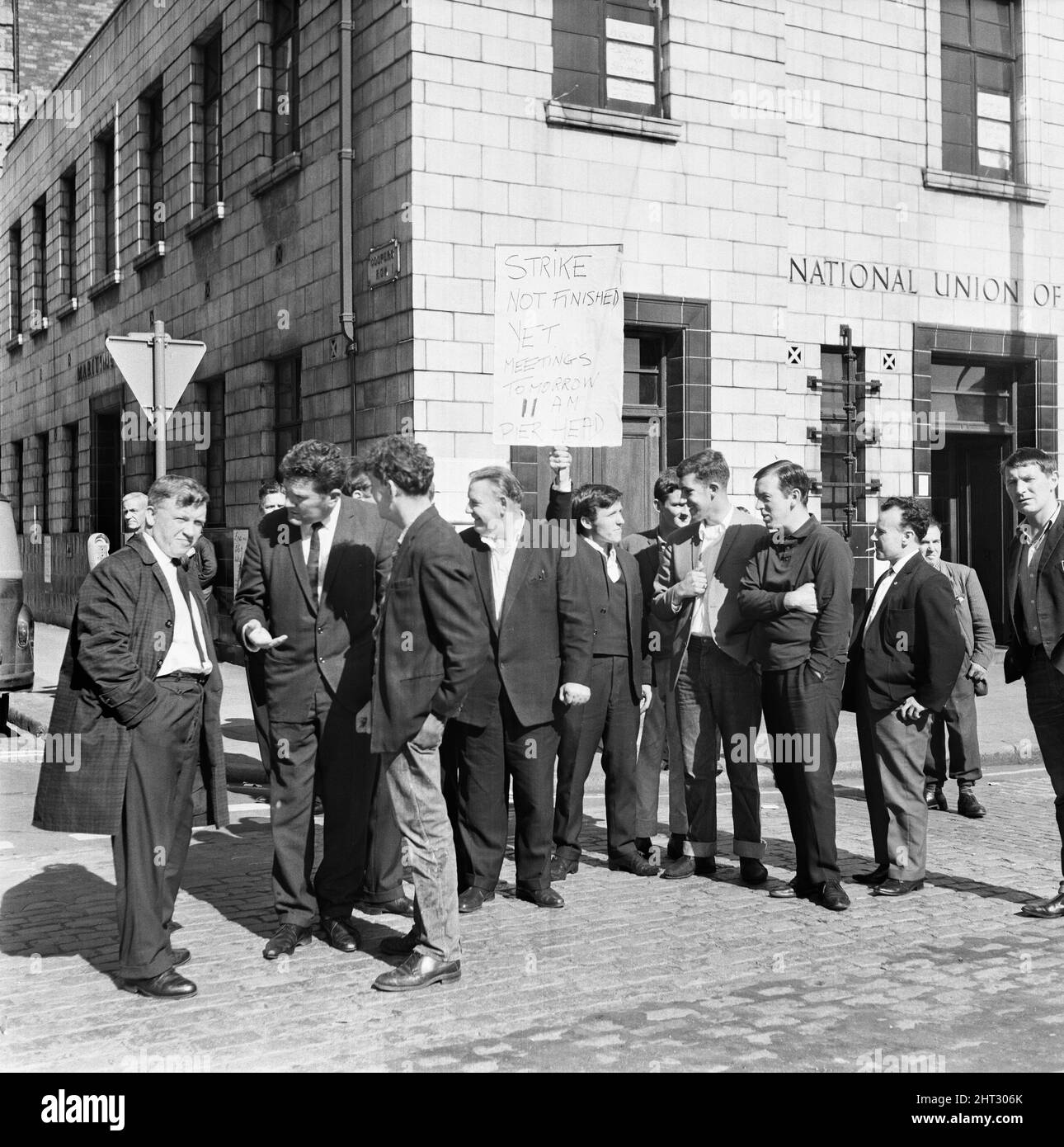 Seaman outside the National Union of Seamen Headquarters in Liverpool ...