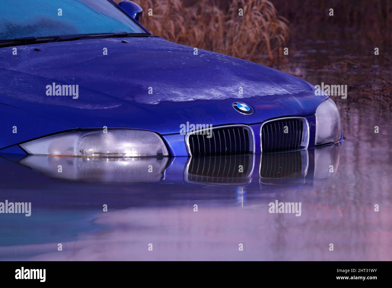 Reflections of a BMW submerged in water on Newton Lane near Castleford ...