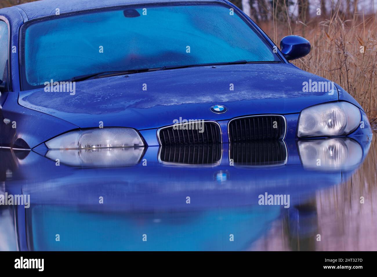 Reflections of a BMW submerged in water on Newton Lane near Castleford ...