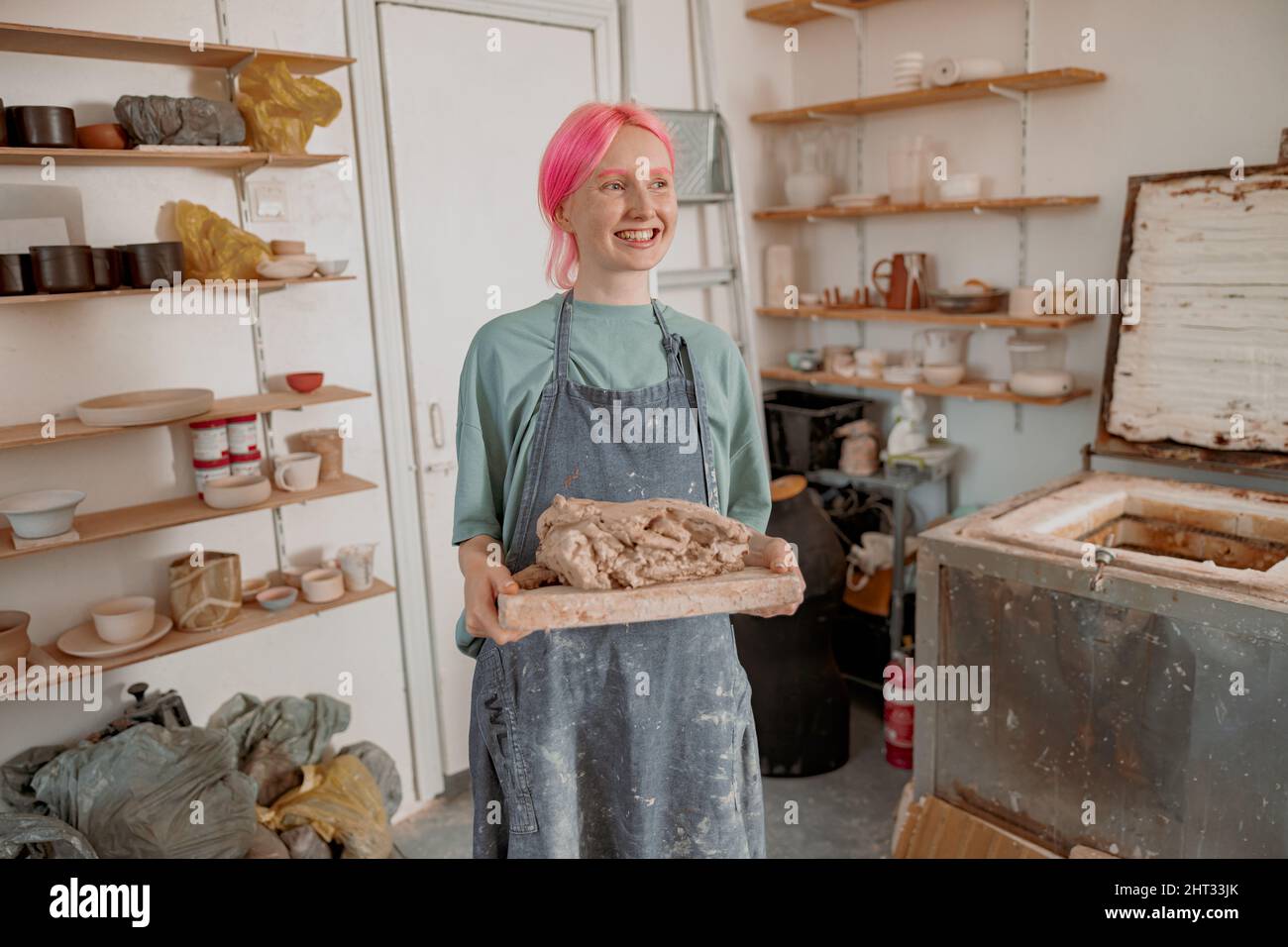 Female master ceramist working at her studio Stock Photo - Alamy