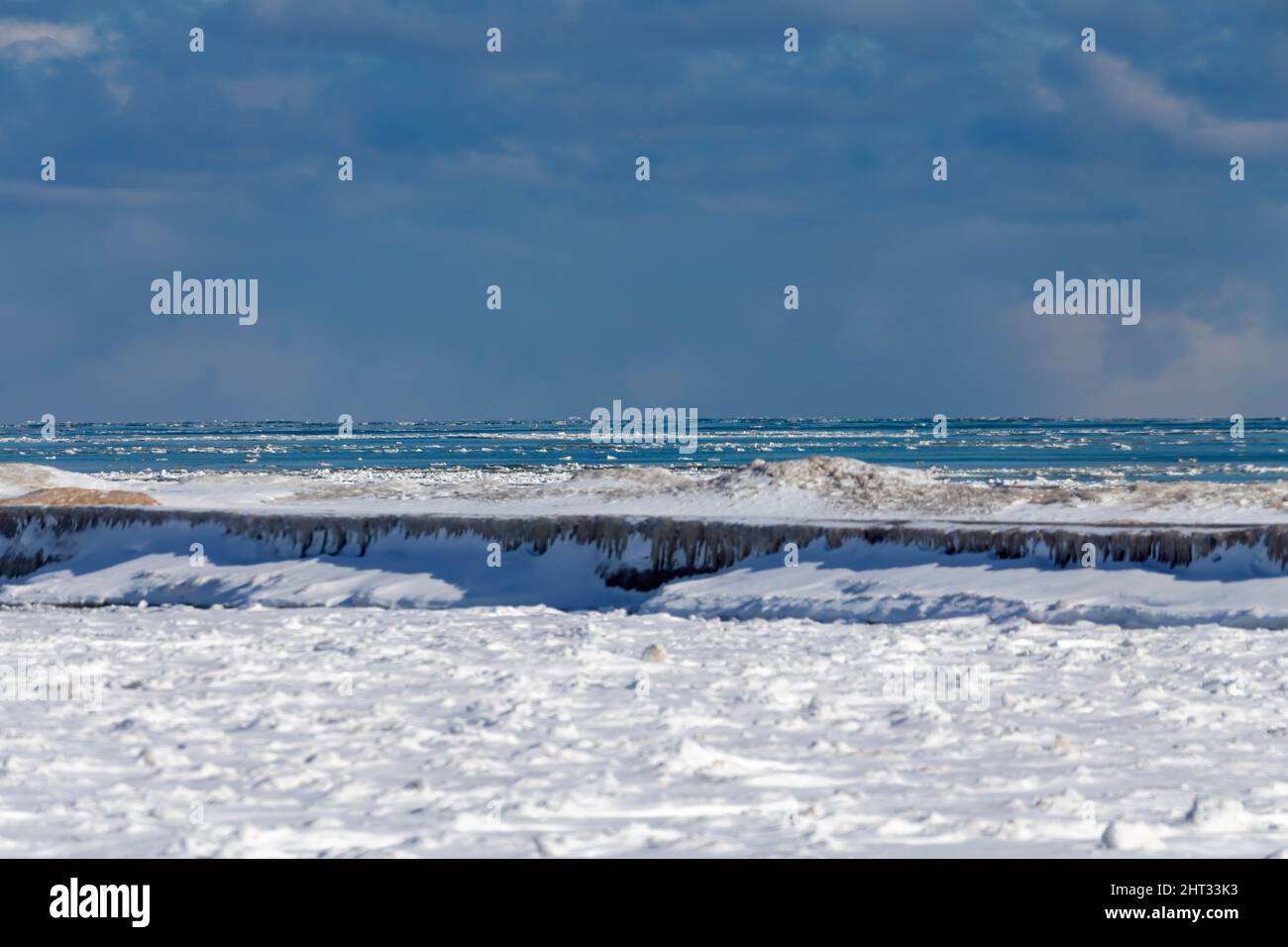 Lake Michigan shoreline and floating ice floes on the lake Stock Photo ...