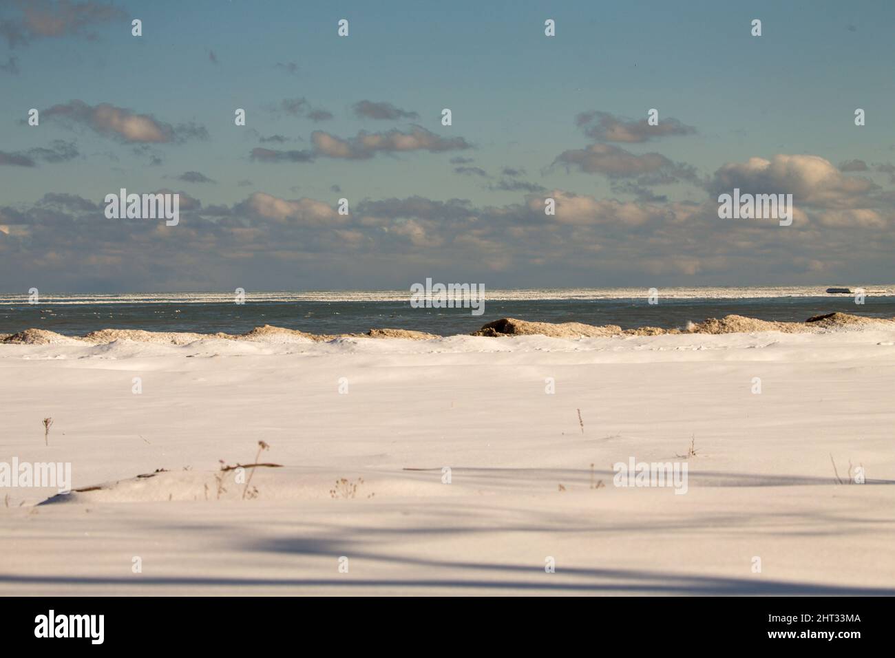 Lake Michigan shoreline and floating ice floes on the lake Stock Photo ...