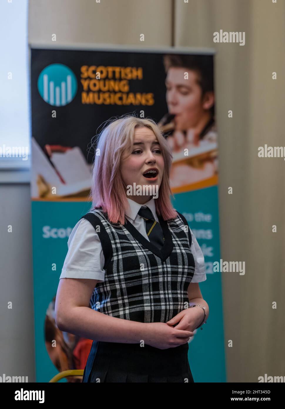 Teenage schoolgirl singing performing at Scottish Young Musician music ...