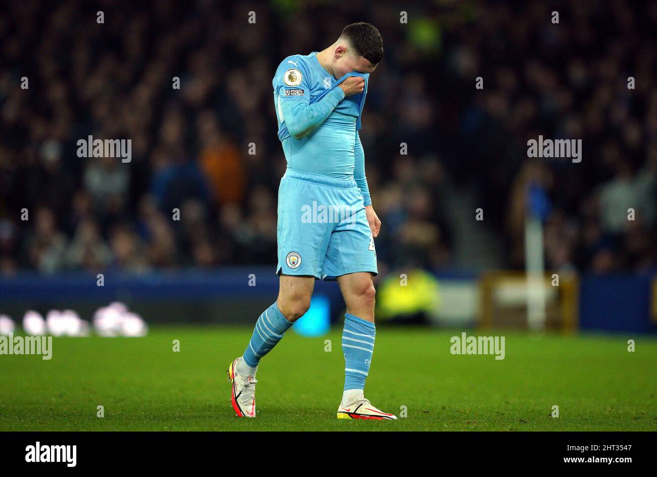 Manchester City's Phil Foden appears injured during the Premier League ...