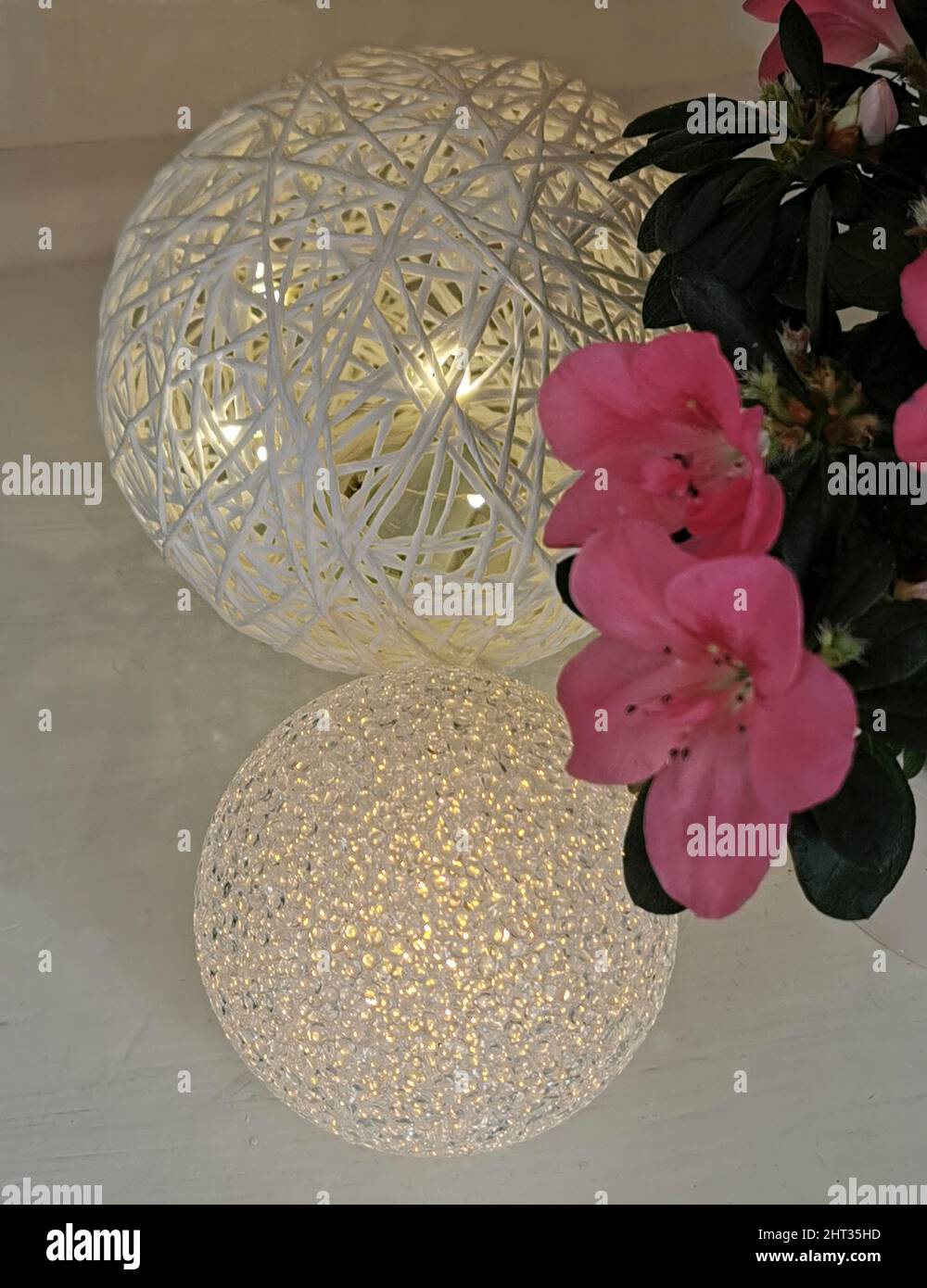 Pink azalea by balls of light Stock Photo - Alamy