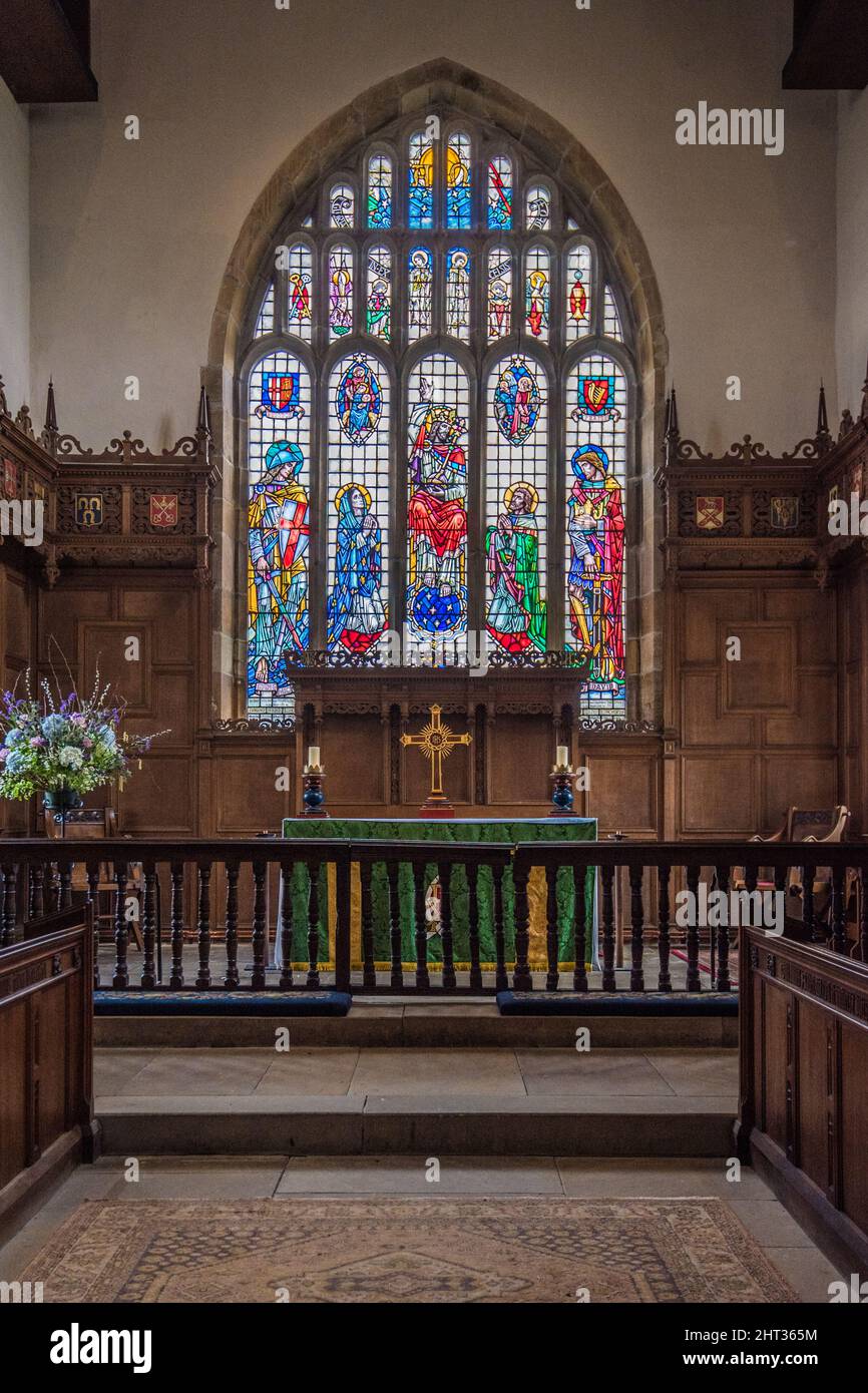 Stained glass windows above the altar at St Michael the Archangel ...