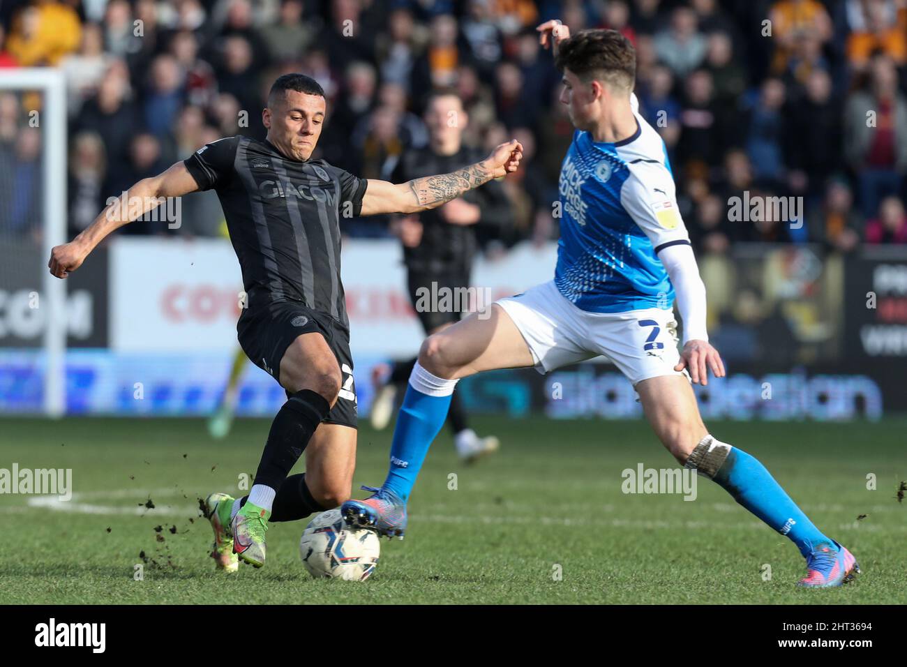 Tyler Smith #22 of Hull City is challenged by Ronnie Edwards #2 of ...