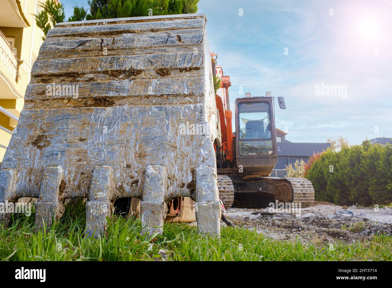 Crawler excavator digging on demolition in construction site concept ...