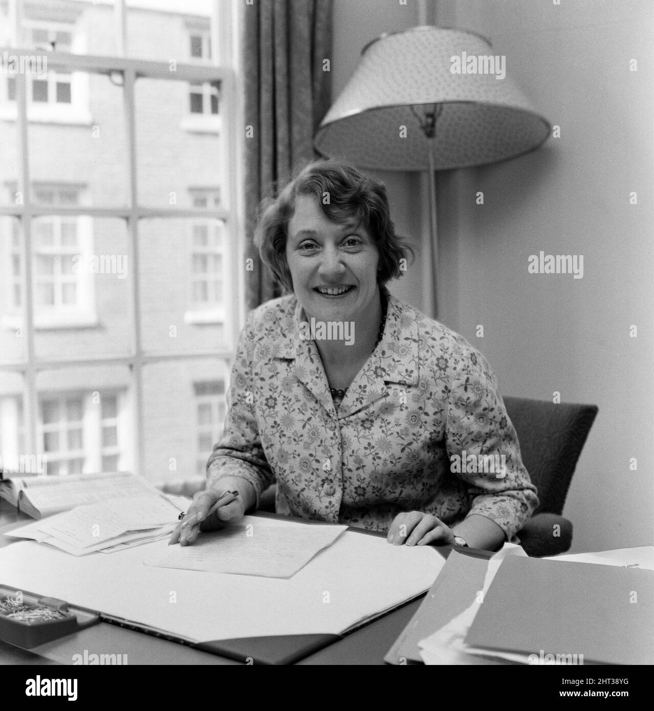 Mrs. Shirley Williams at her desk at the Ministry of Labour at St ...