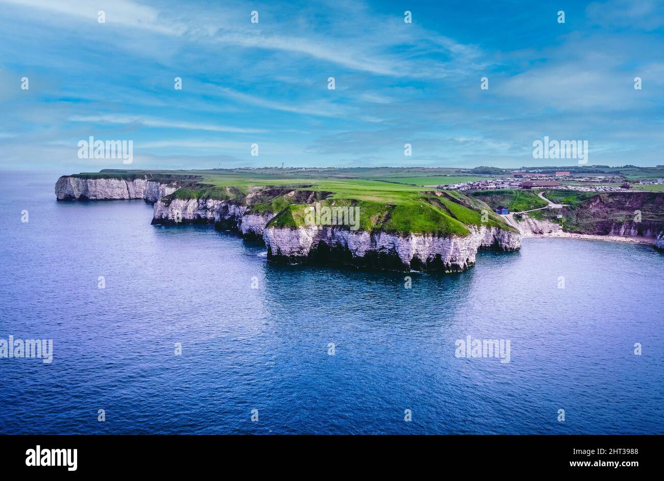Aerial scenic view of a limestone cliff under cloudy blue sky Stock ...