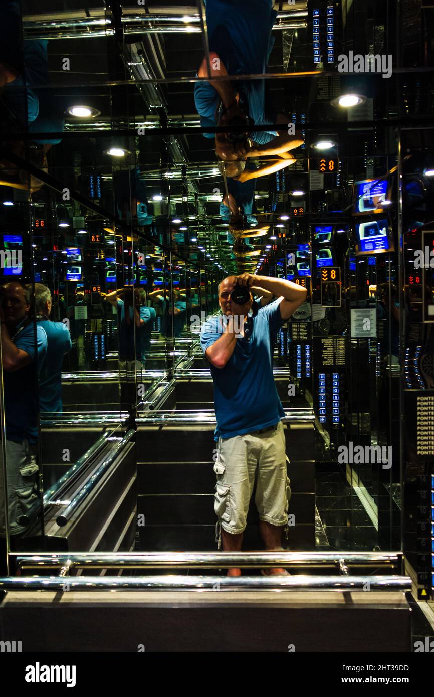 Man in a elevator with camera hi-res stock photography and images - Alamy