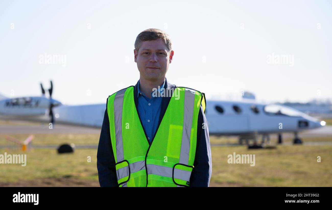 Interim CEO of Eviation, Greg Davis, poses for a photo with the Alice ...