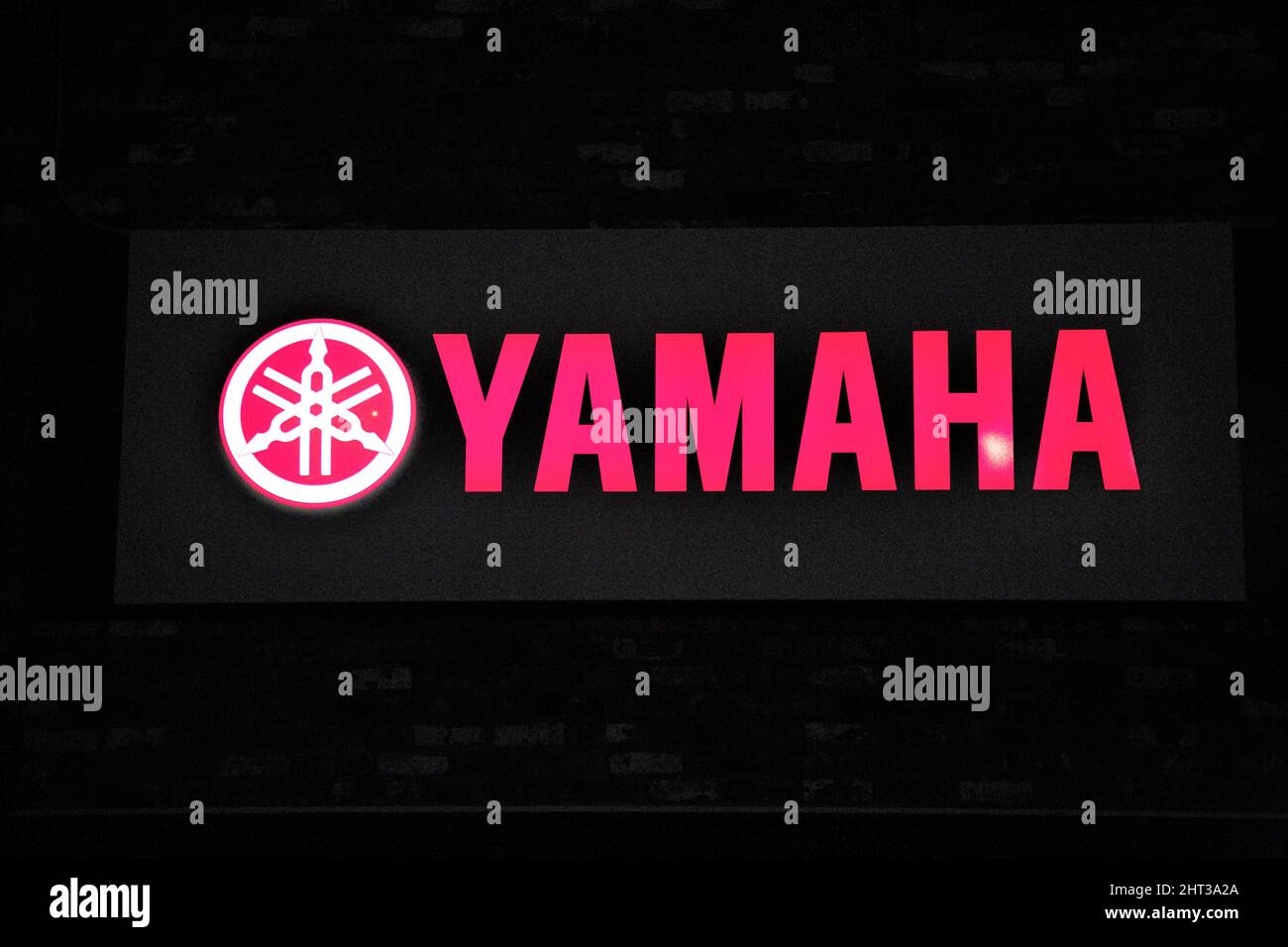 Photo of a Yamaha sign taken at night Stock Photo - Alamy