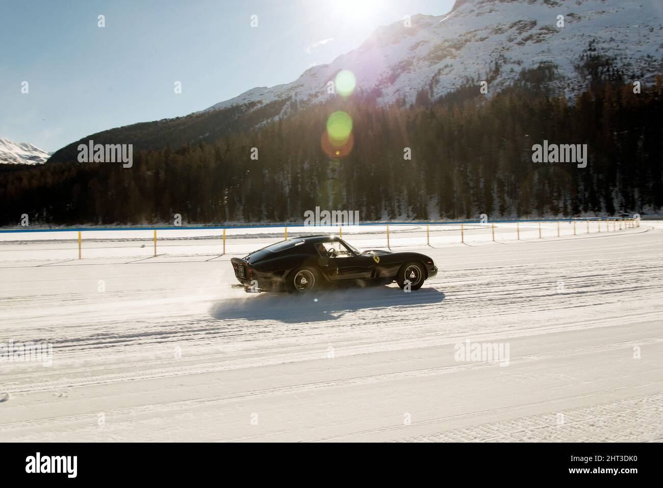 A classic vintage car on the frozen lake of St Moritz in winter Stock ...
