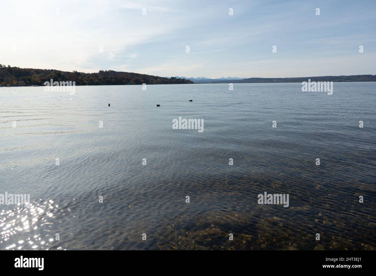 View from a lake with pure and clear waters on a fine day Stock Photo ...