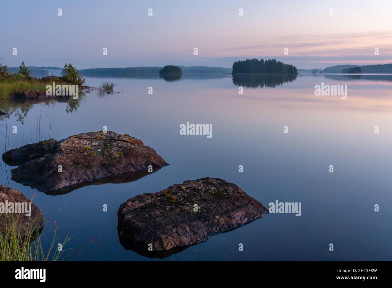 Beautiful scenery of dawn on the lake in Finland Stock Photo - Alamy