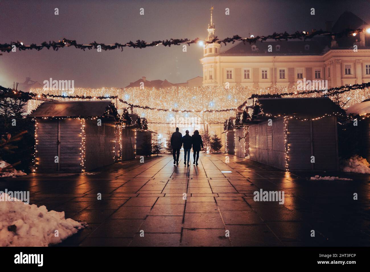 People walking during cold winter night Stock Photo - Alamy