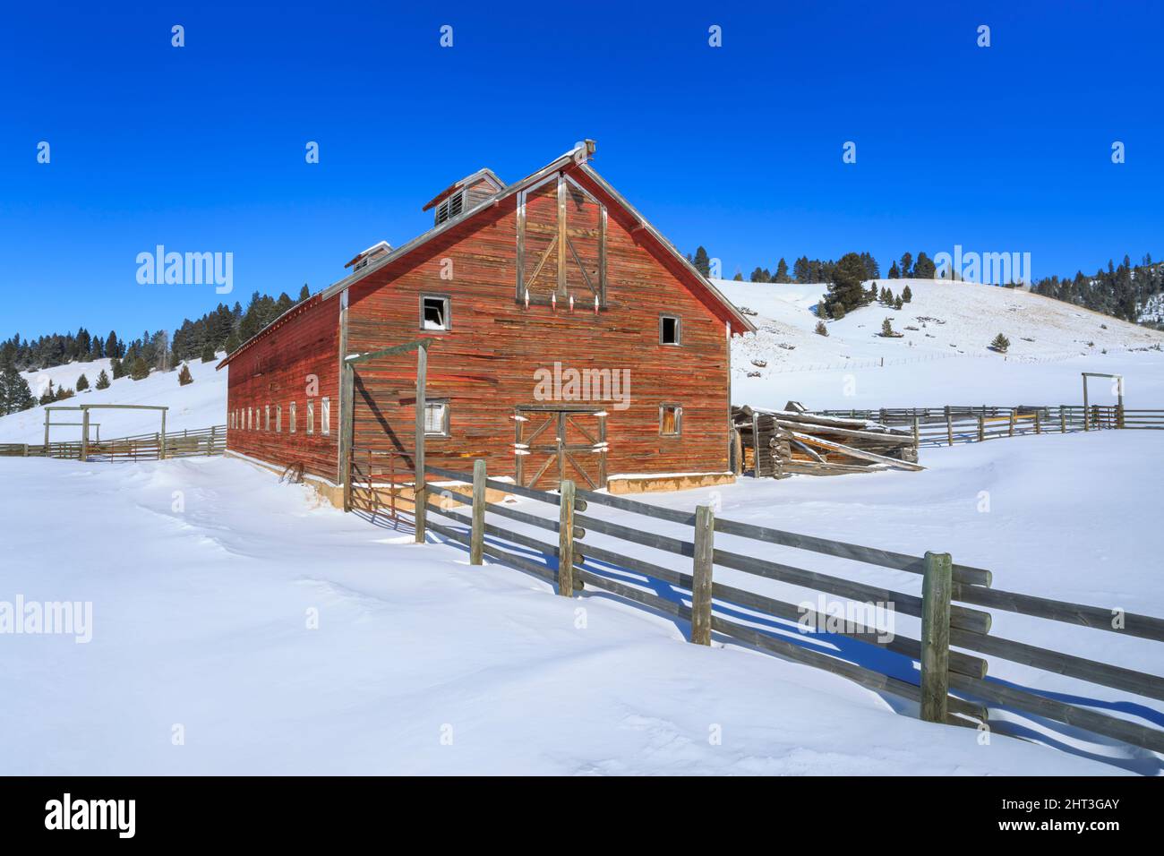 old red barn in winter in the dog creek valley near elliston, montana ...