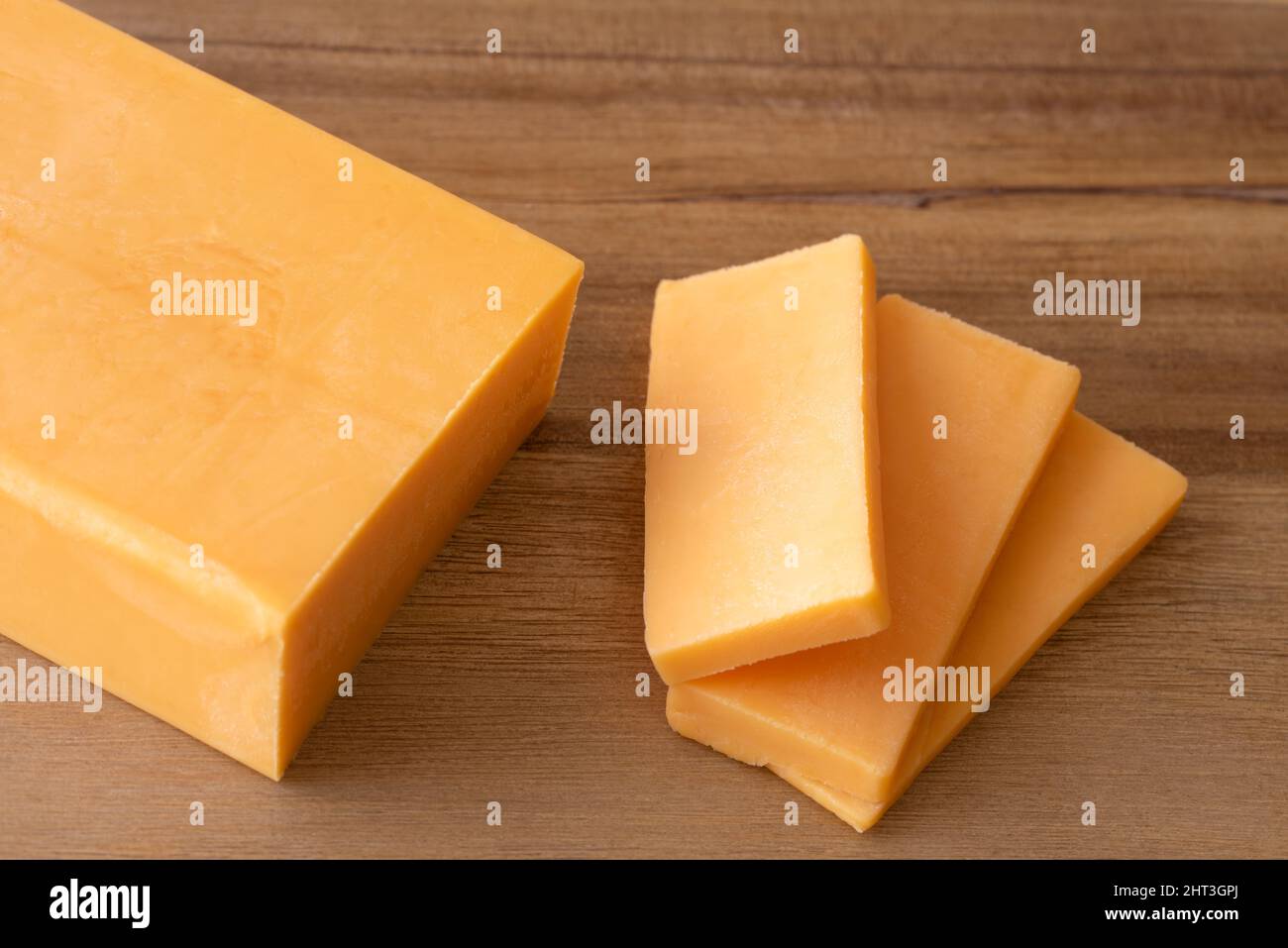 Block Sharp Cheddar Cheese Stock Photo - Alamy