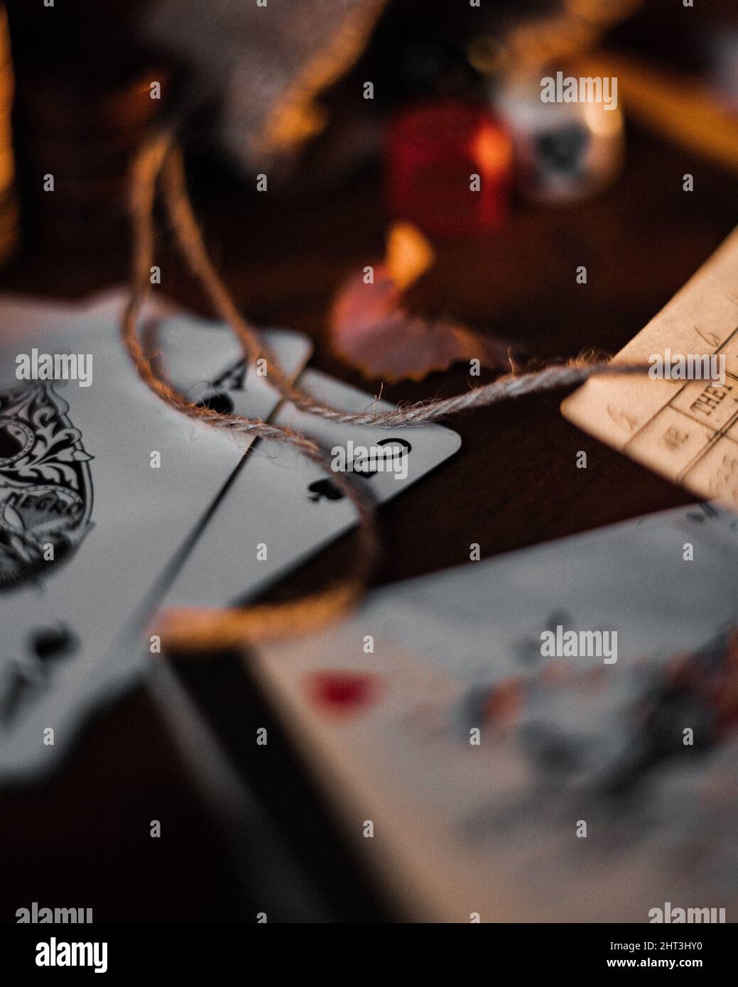 Closeup shot of playing card and game dices on the wooden surface in ...