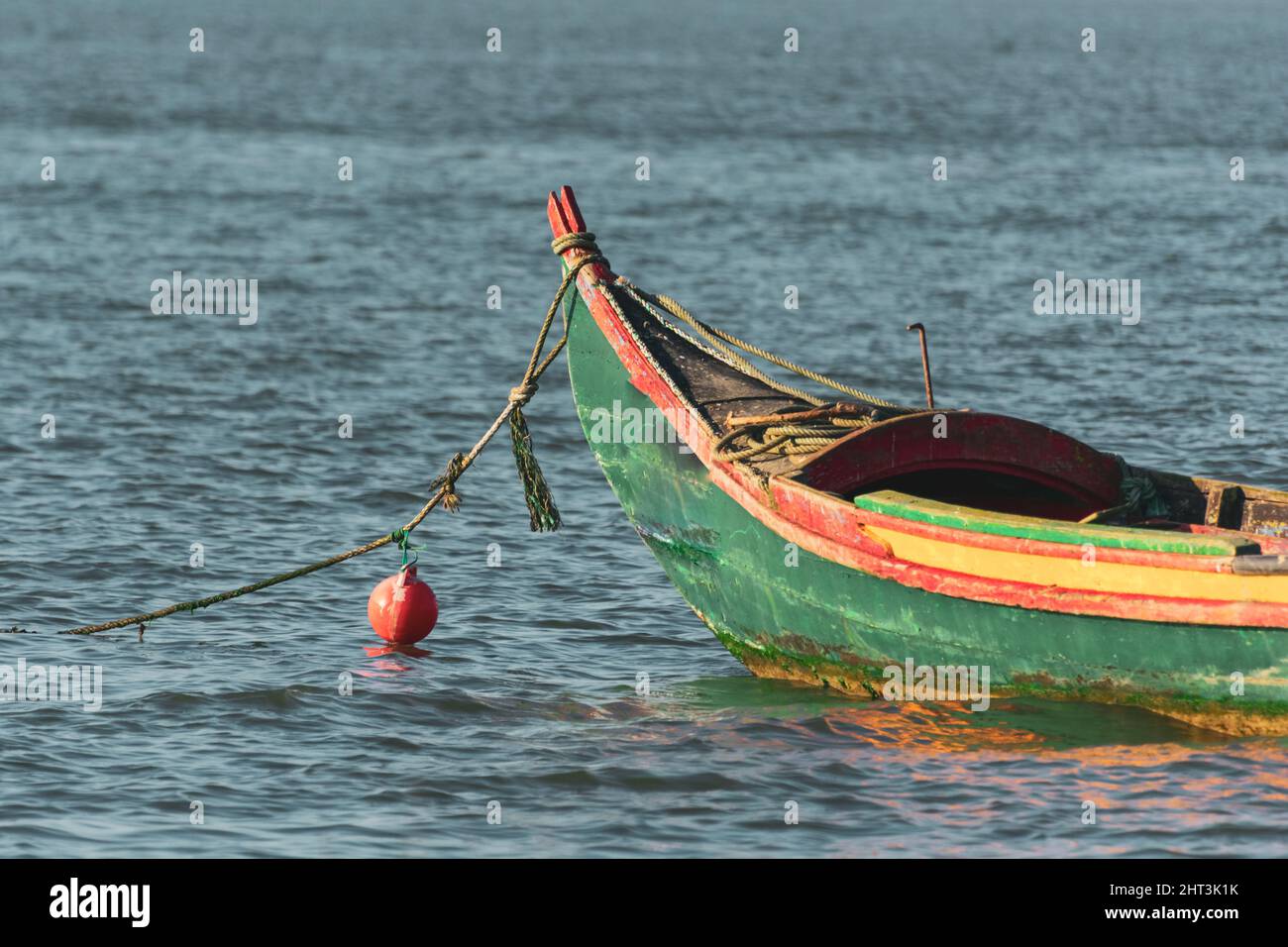 Boat on a wavy water Stock Photo - Alamy
