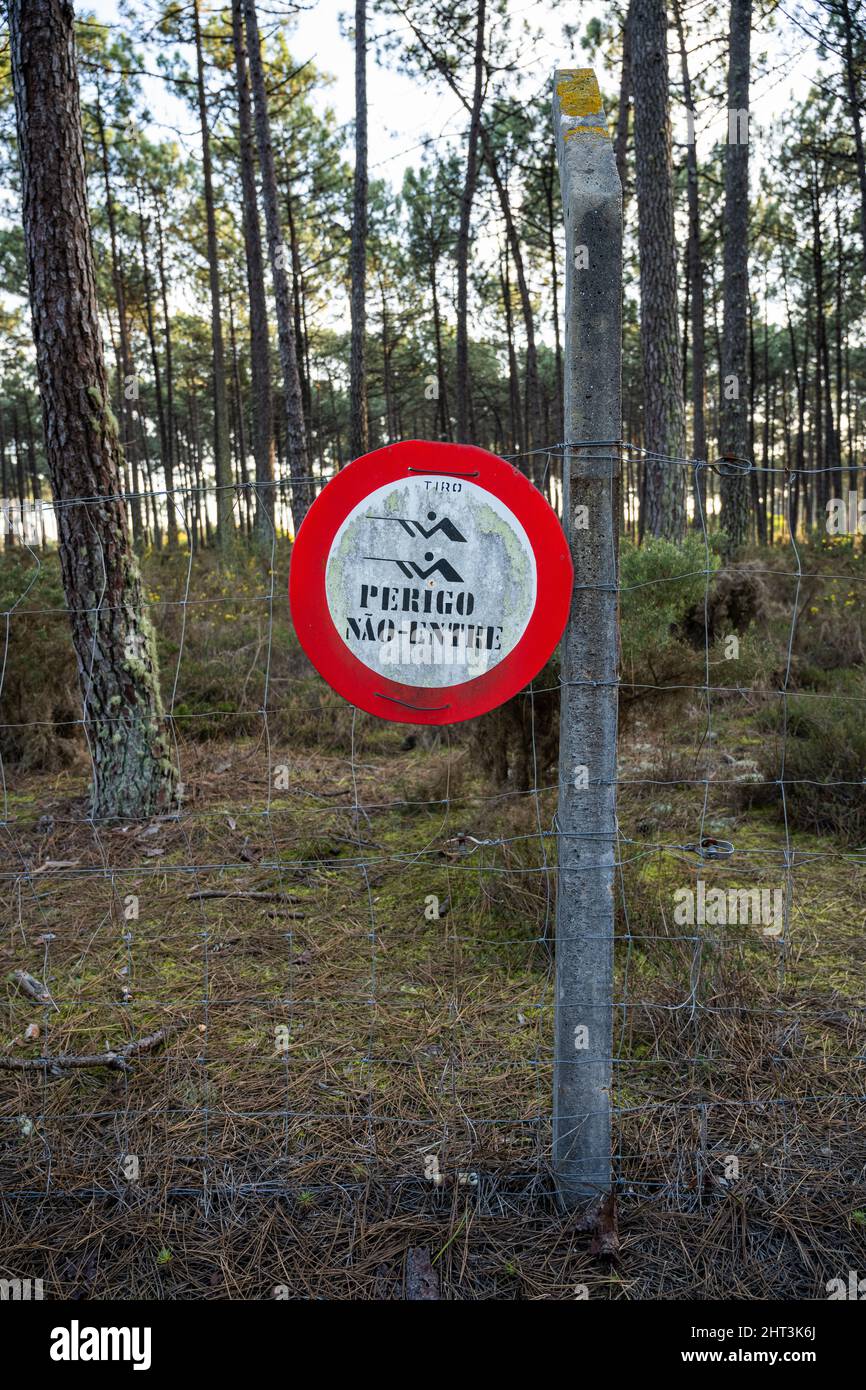 Entry ban sign. Portuguese advise of danger shot do not enter Stock ...