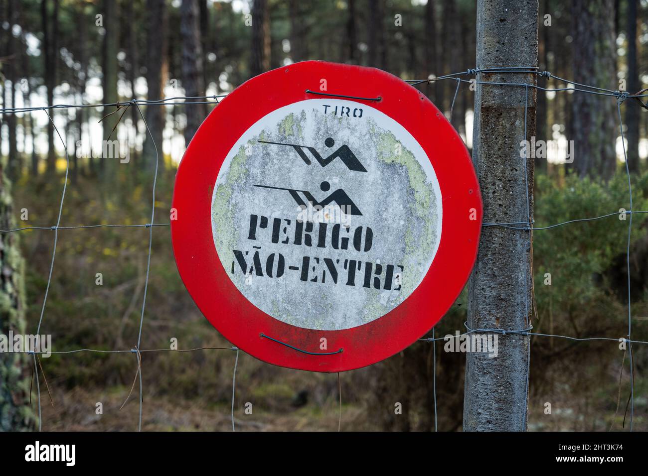 Entry ban sign. Portuguese advise of danger shot do not enter Stock ...