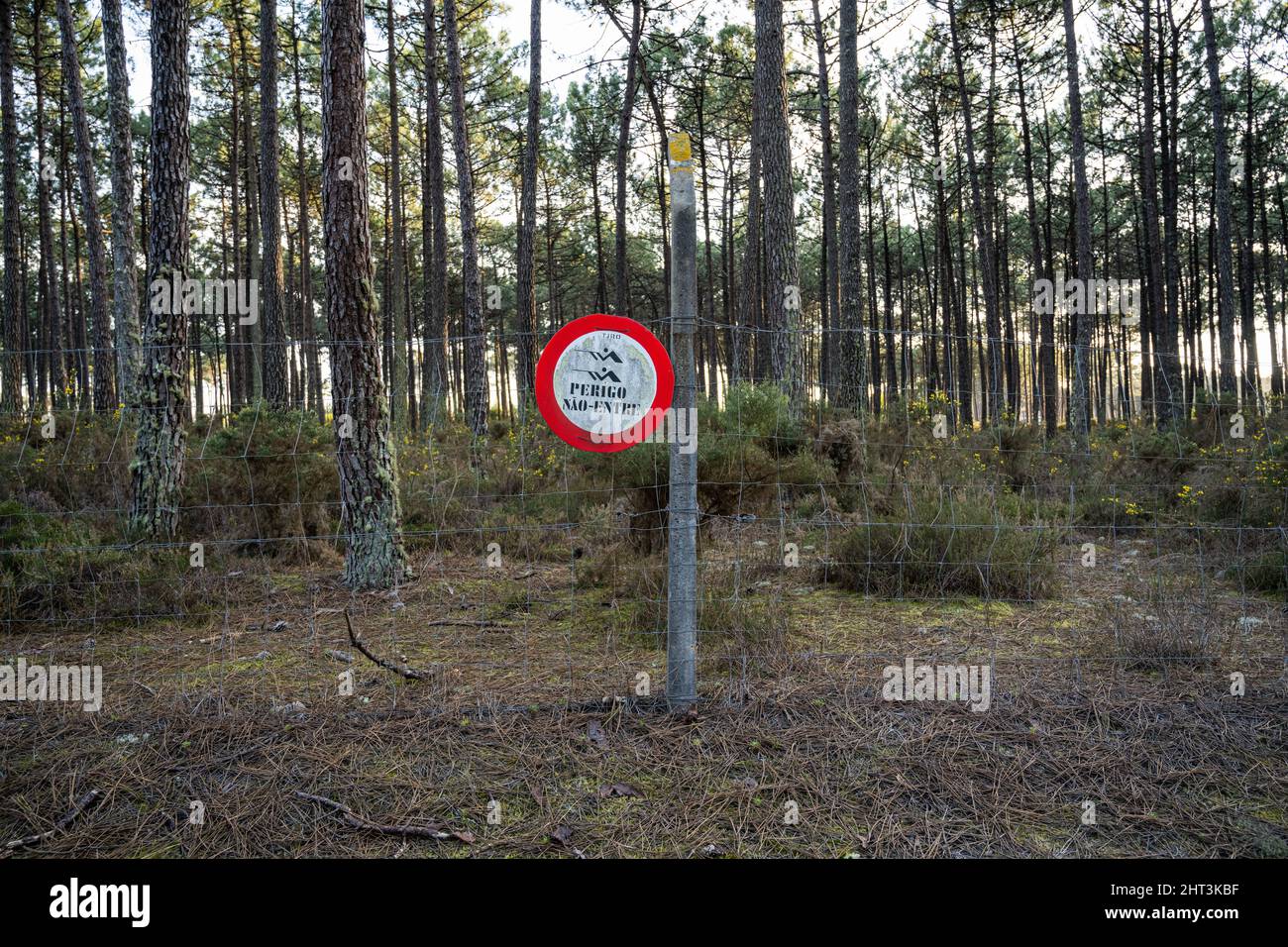 Entry ban sign. Portuguese advise of danger shot do not enter Stock ...