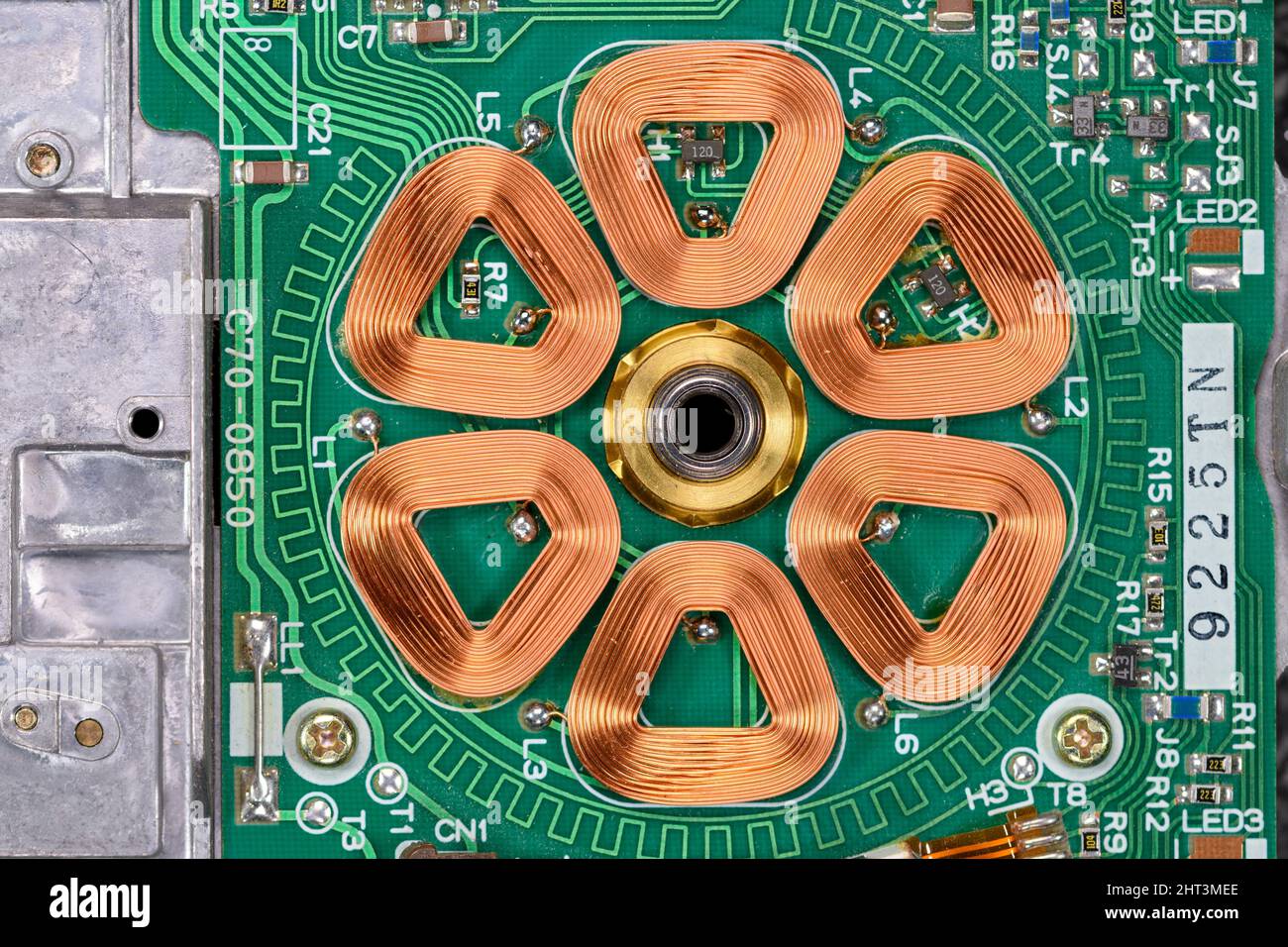 DVD drive motor windings on a printed circuit board. This type of motor ...