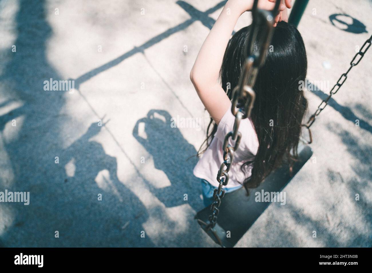 Girl shadow swing hi-res stock photography and images - Alamy