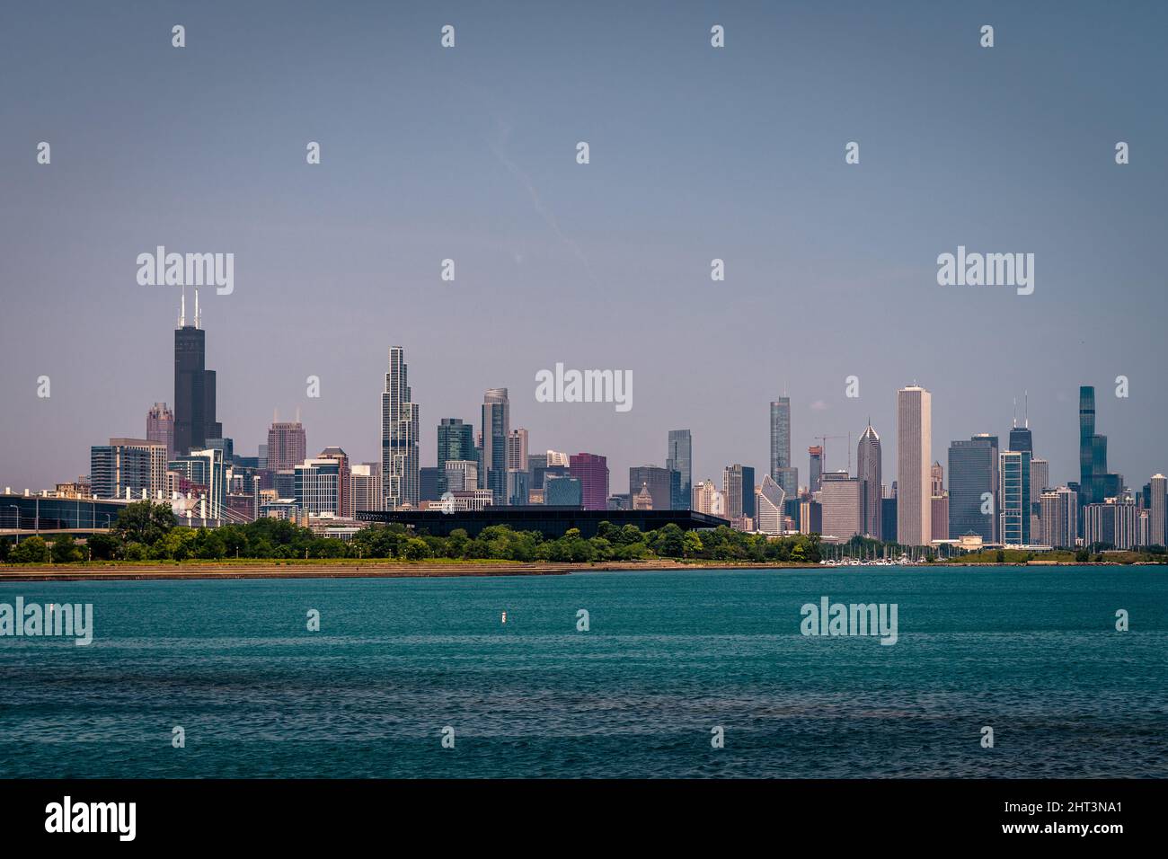 Urban scenery of modern buildings in a lakeside business district at ...