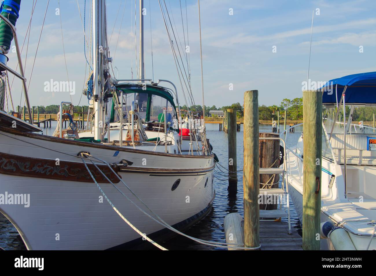 Sailboat tied up at Carrabelle Florida marina Stock Photo - Alamy